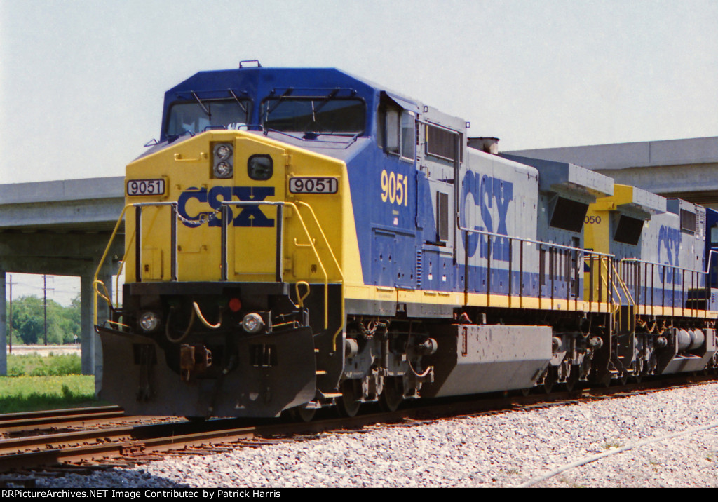 CSX 9051 C44-9W front view holding immediately east of the Paris Road service road awaiting ...